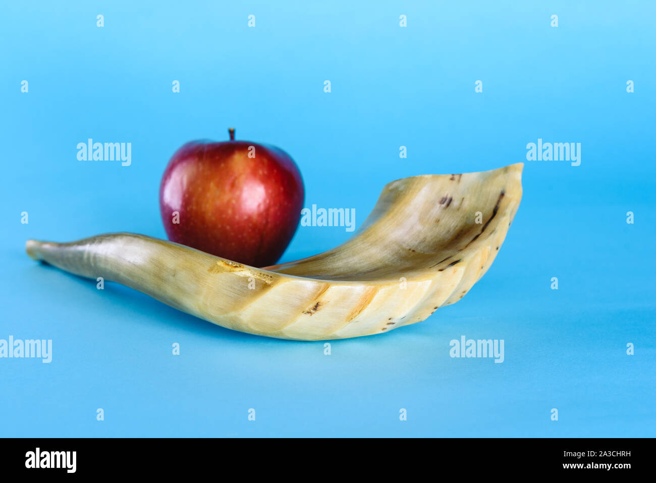 Rosh Ha Shana - Jewish new year composition of an red apple and Shofar ...