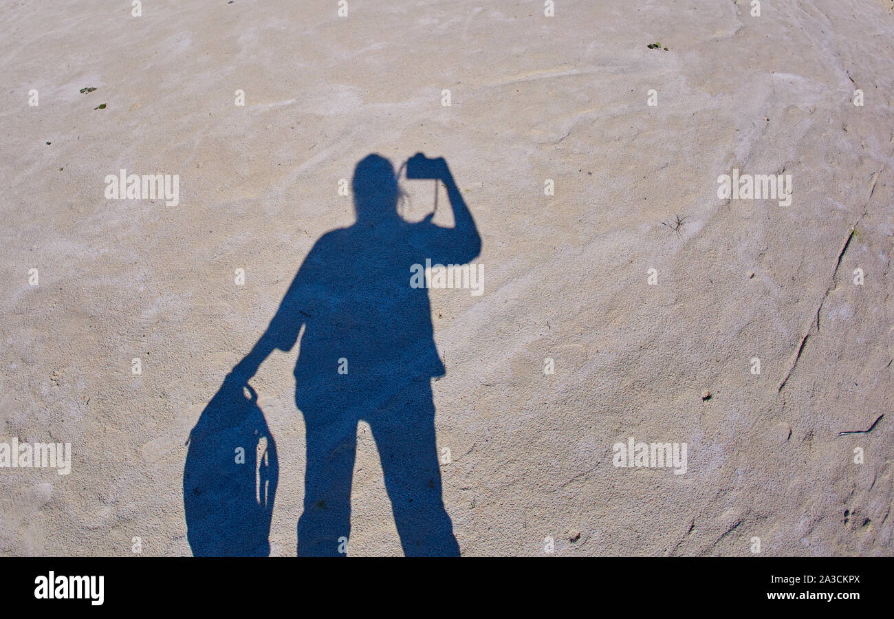 Shadow self portrait in landscape hi-res stock photography and images ...