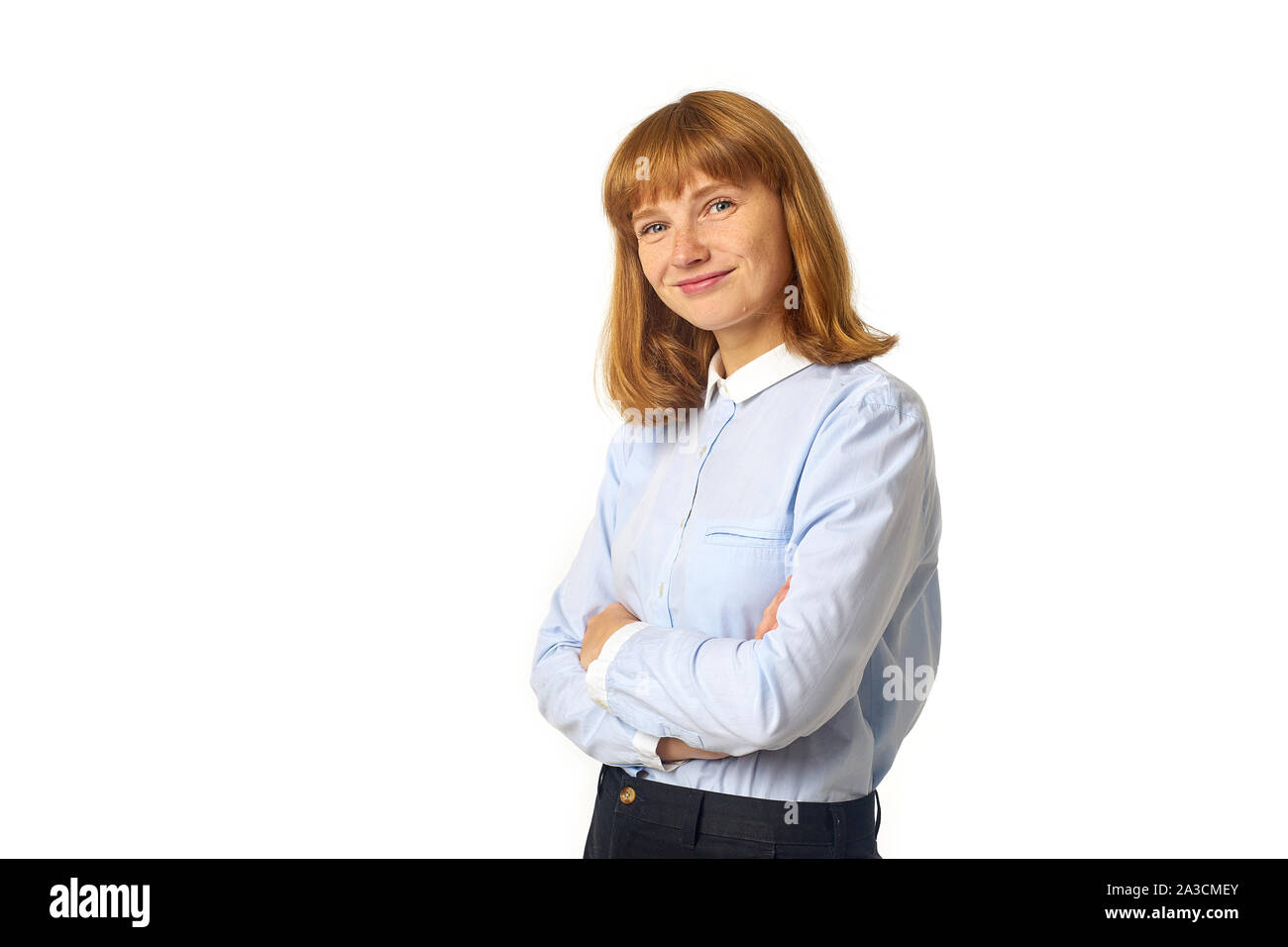 Headshot of young female model with ginger hair and freckles dressed in ...