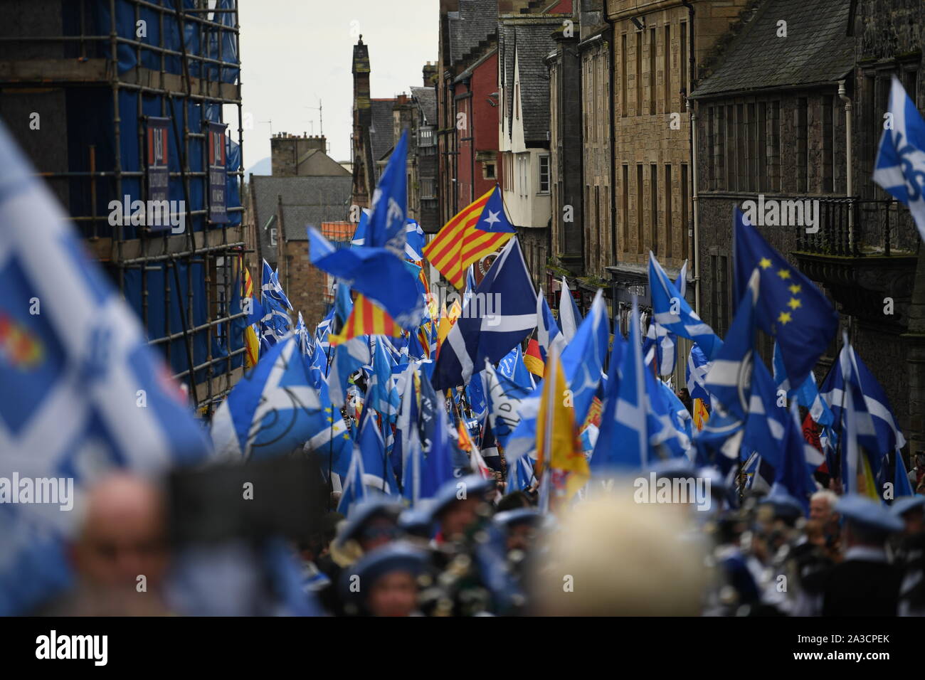 Marchers and their Scottish Nationalist flags Stock Photo - Alamy