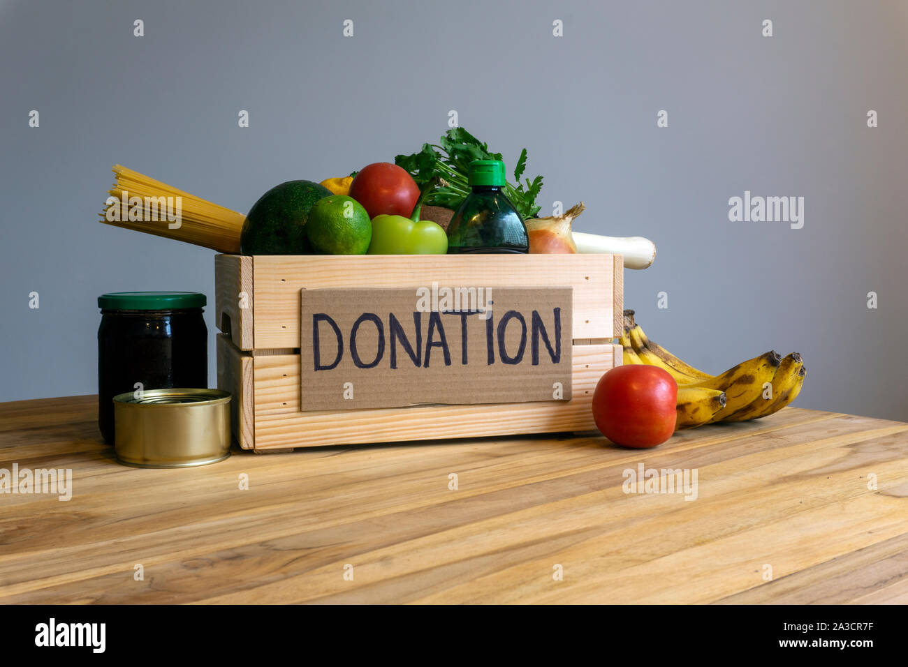 Food donation concept. Donation box with vegetables, fruits and other ...