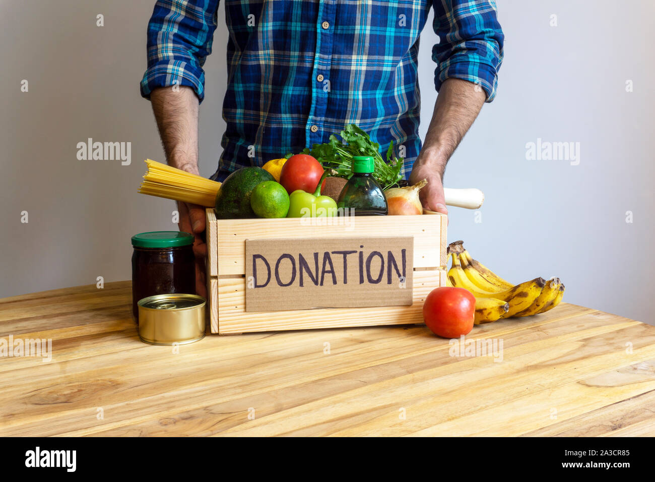 Child giving homeless man food hi-res stock photography and images - Alamy