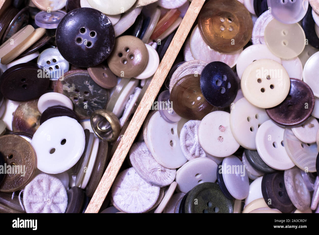 Two sets of vintage clothing buttons texture Stock Photo - Alamy