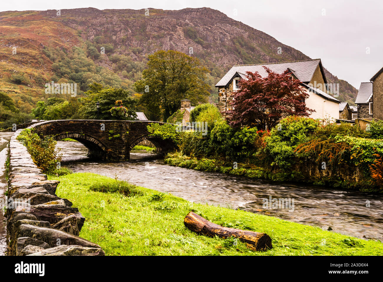 River and arched bridge at Beddgelert, Snowdonia NP, Wales, UK Stock ...