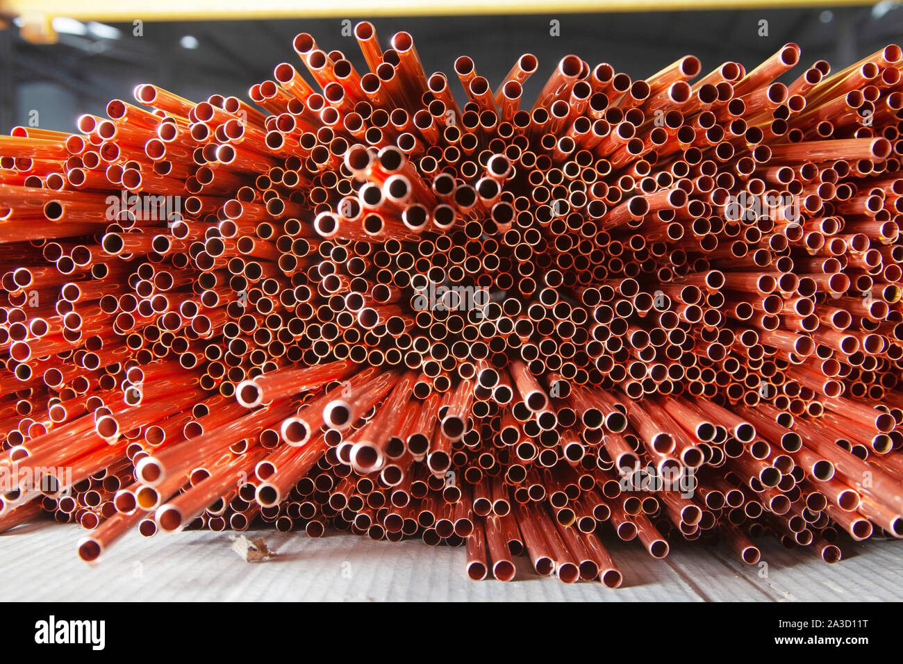 Copper pipes in factory, industrial background Stock Photo - Alamy