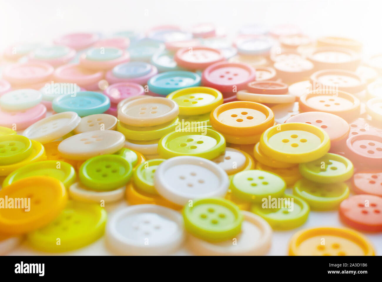 A lot of Colorful Sewing buttons. Bright background Stock Photo - Alamy
