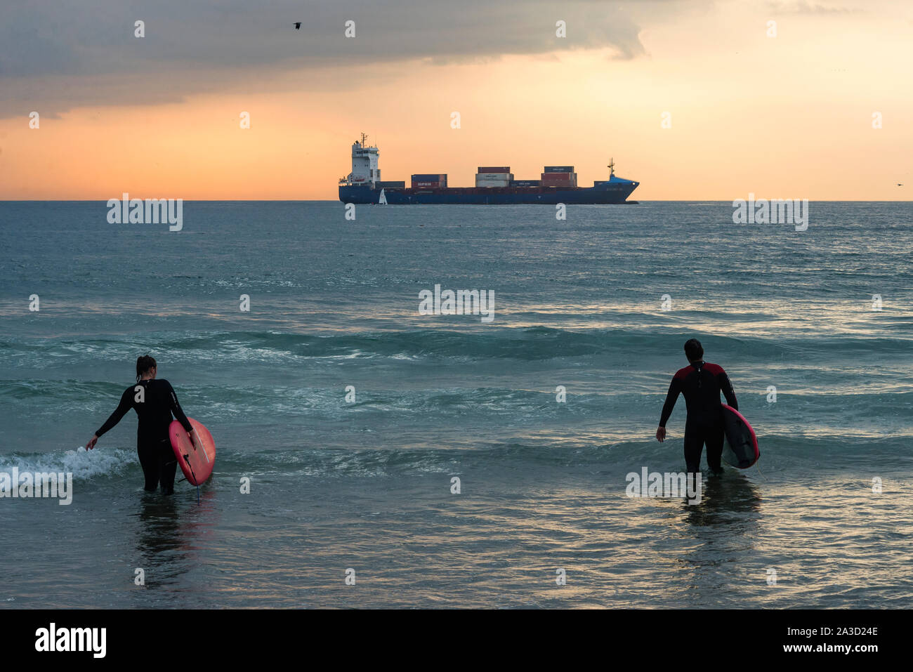 Surf and containers Stock Photo - Alamy