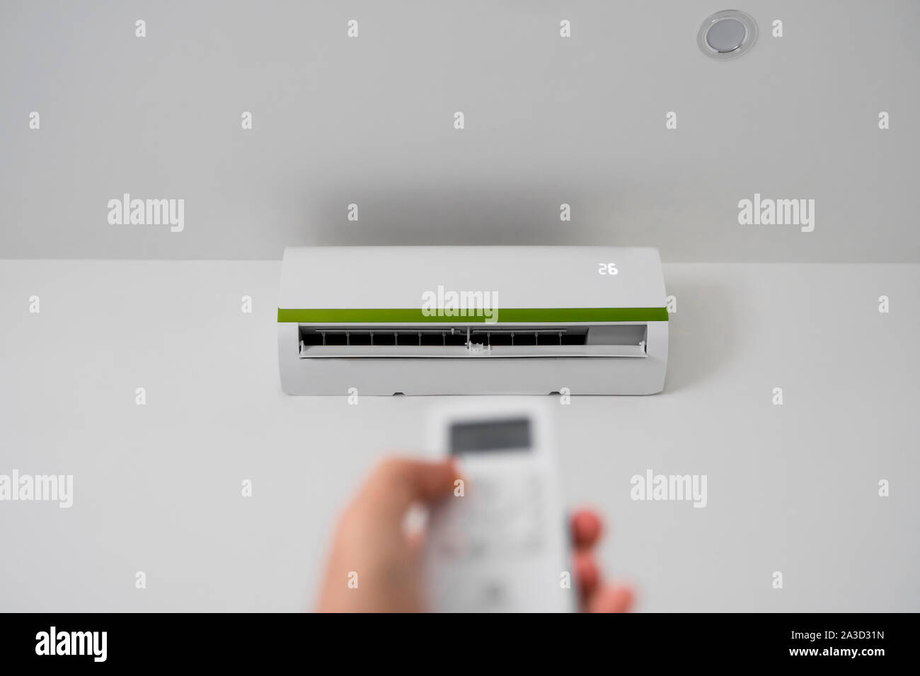 Man's hand using remote controler. Hand holding rc and adjusting ...