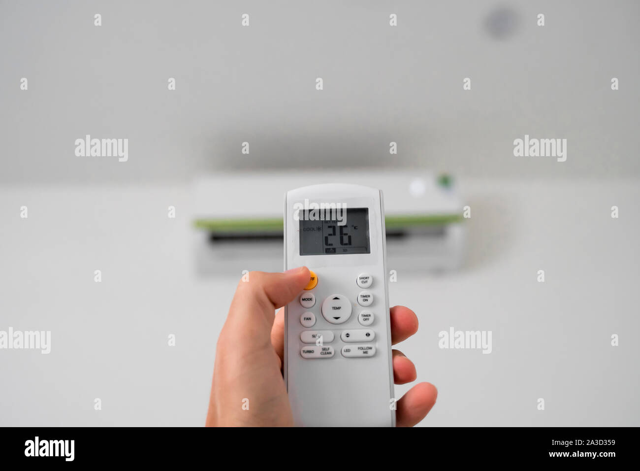 Man's hand using remote controler. Hand holding rc and adjusting ...