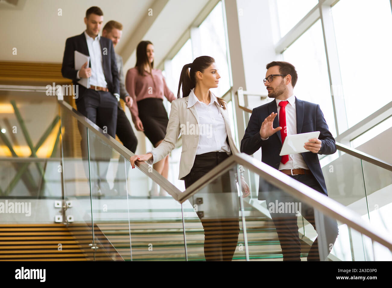 Group of people walking down stairs hi-res stock photography and images ...