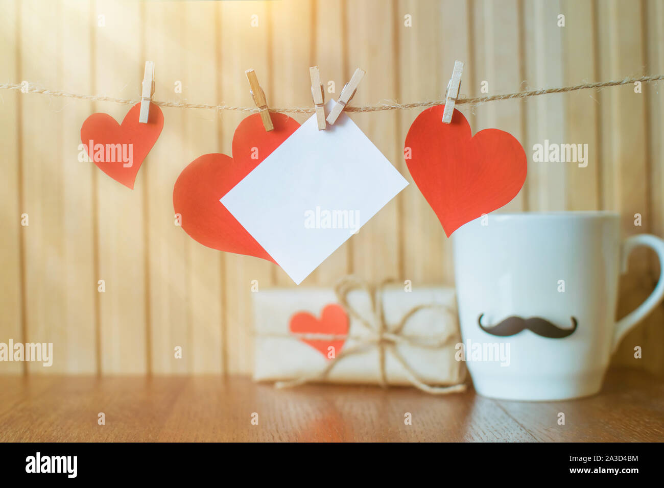 Fathers day. Card for message with paper hearts hanging with ...