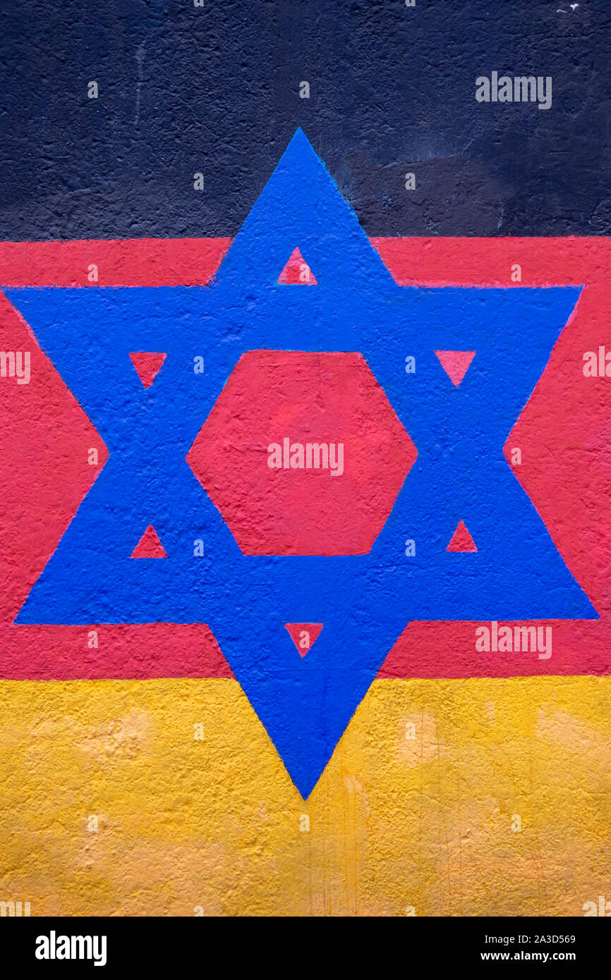 jewish symbol painted over german flag Stock Photo - Alamy