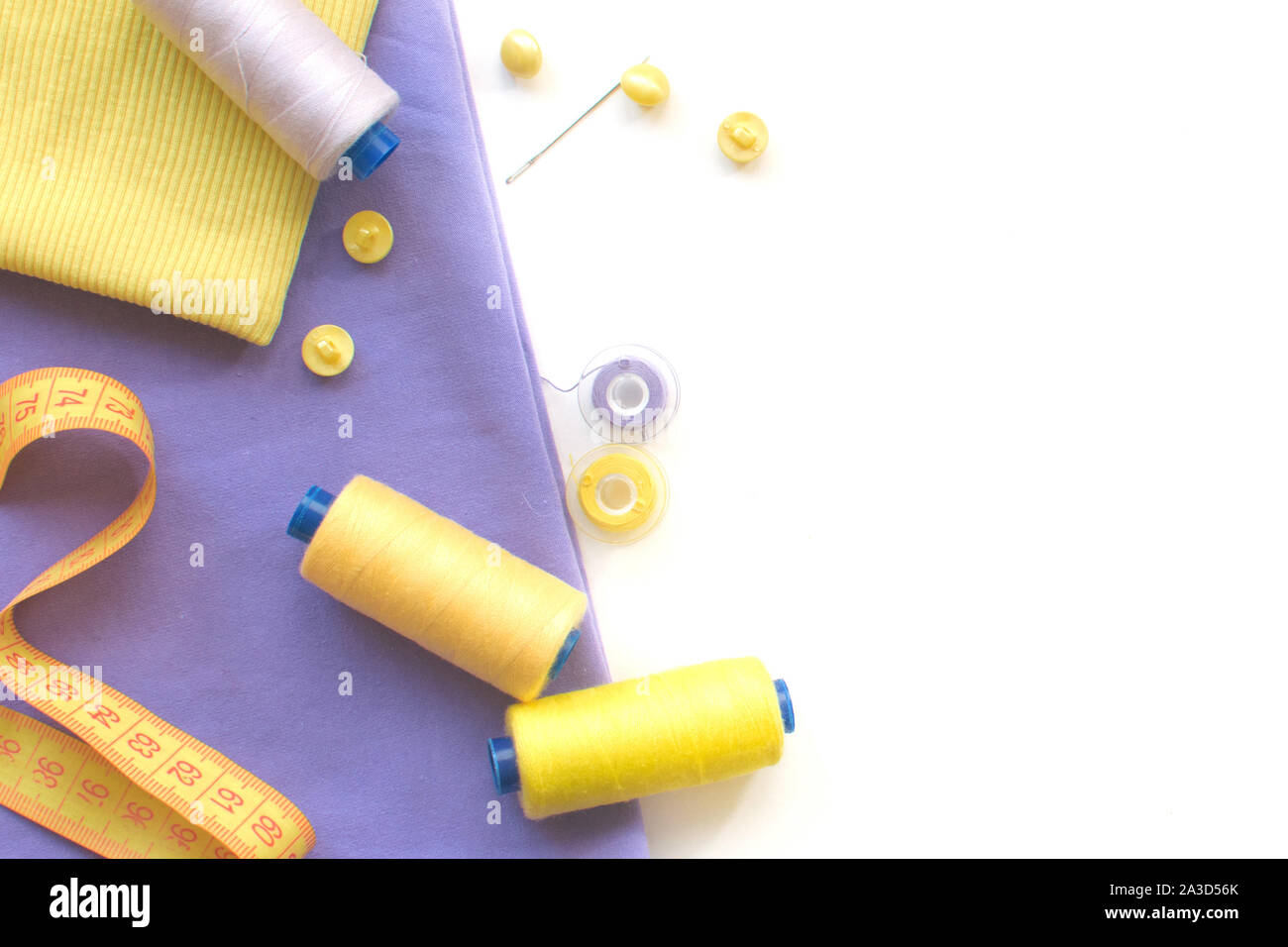 Sewing accessories and fabric on a white background. Fabric, sewing ...