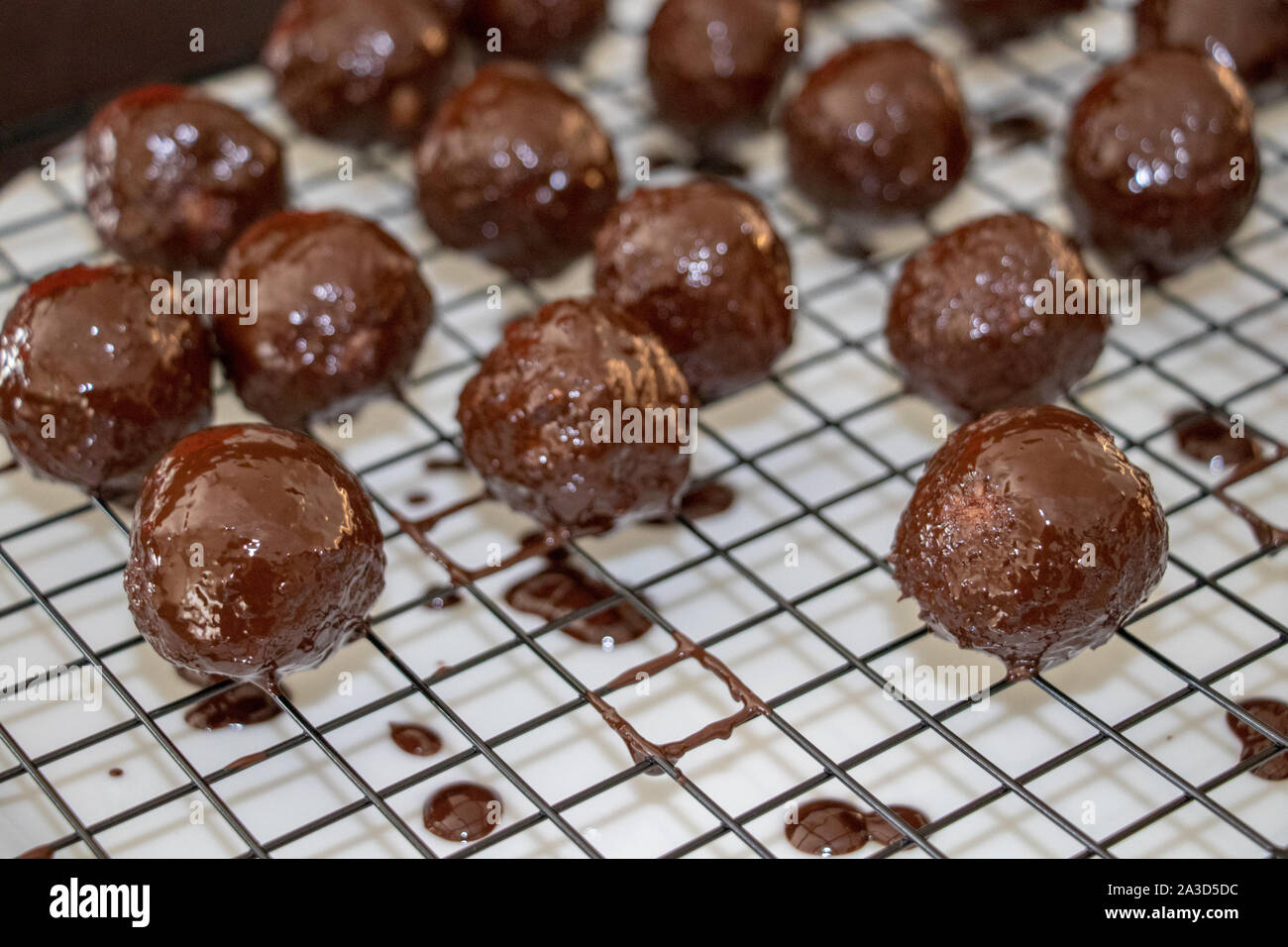 Fresh chocolate balls on kitchen counter Stock Photo - Alamy