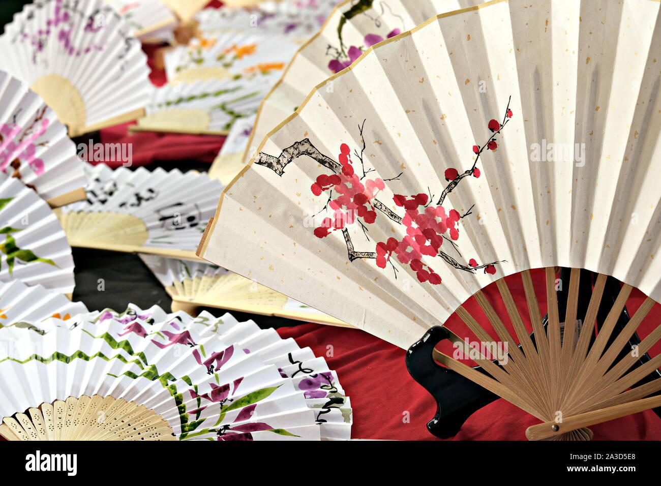 Composition of decorated japanese fans Stock Photo - Alamy