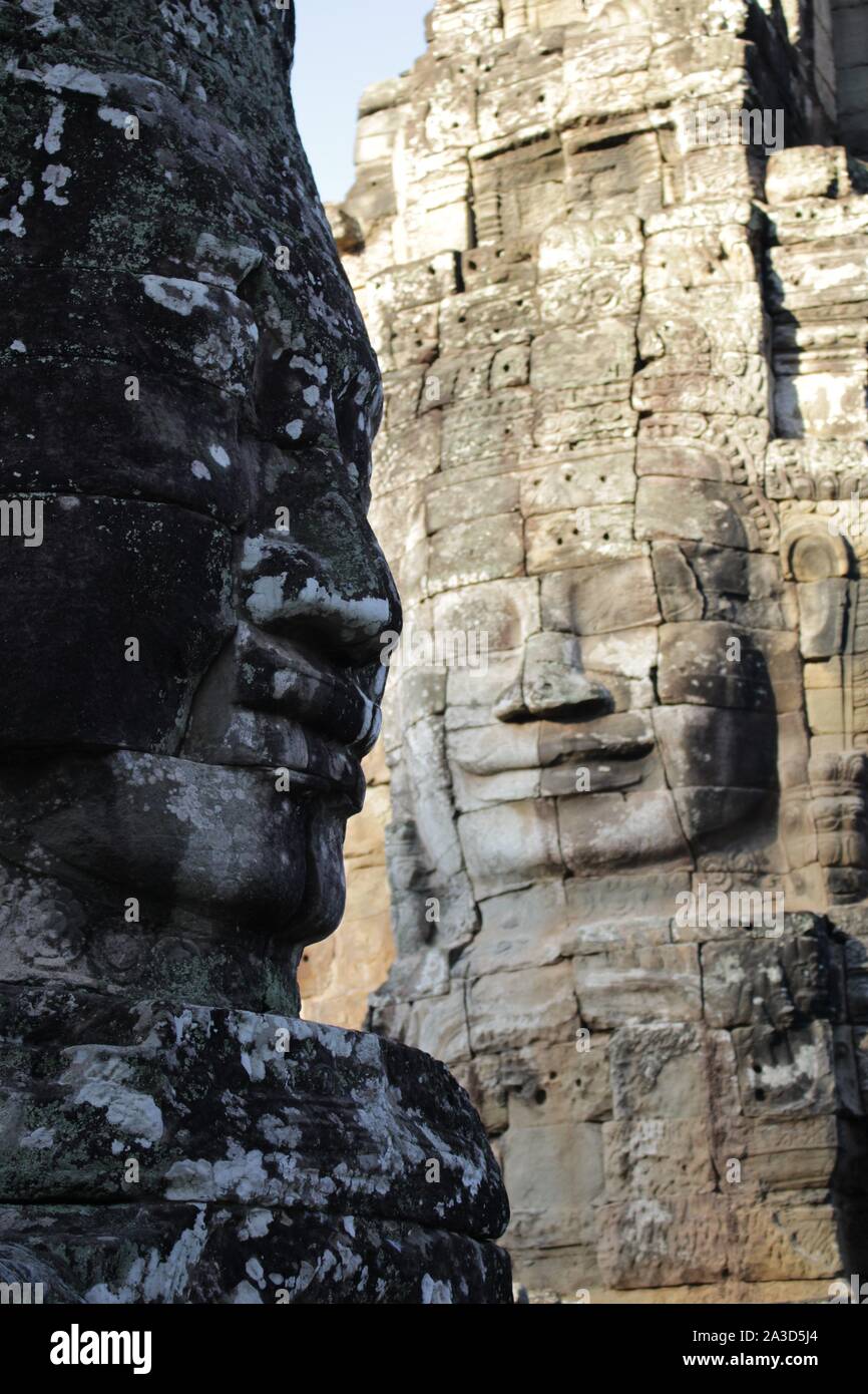 Ancient stone faces of Bayon temple / Angkor Wat / Siam Reap / Cambodia ...