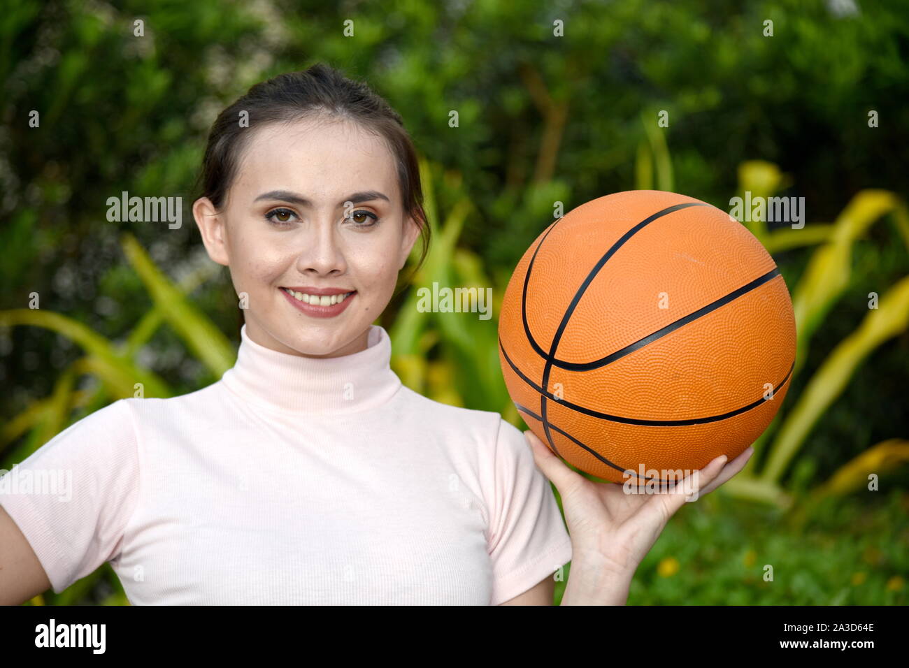 An Athlete And Happiness With Basketball Stock Photo - Alamy