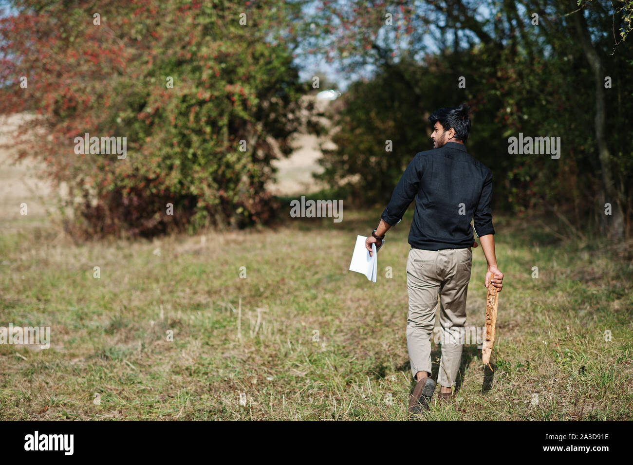 South asian agronomist farmer inspecting his farm. Agriculture ...