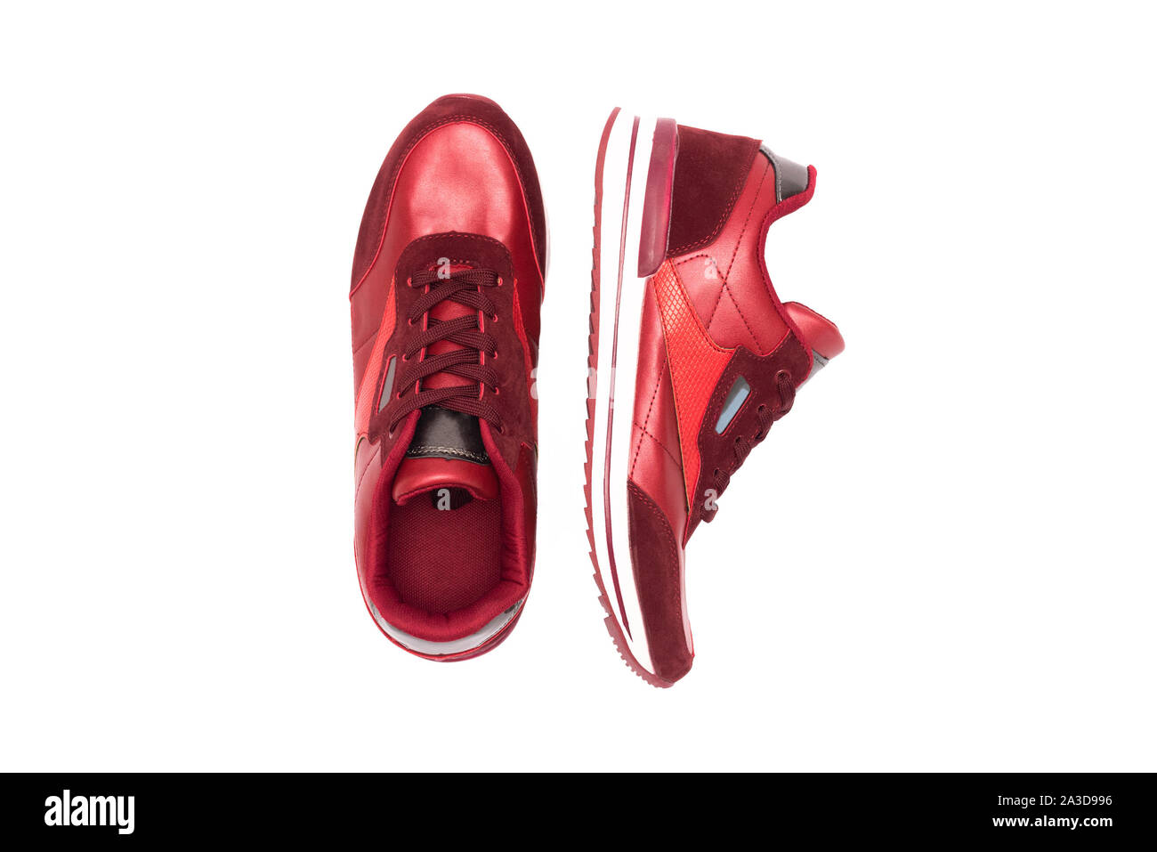 Red sport shoes isolated on white background Stock Photo - Alamy