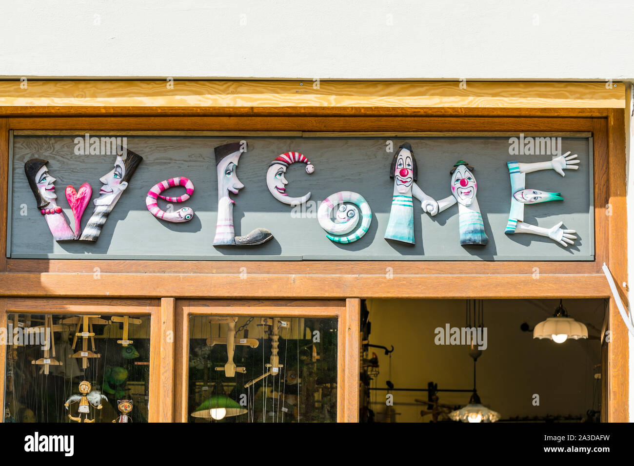 A facade with "welcome" on a shop front in Lesser town of Prague, Czech ...