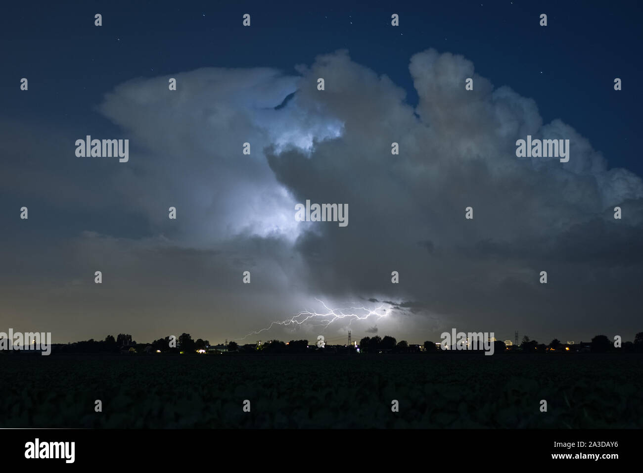 Horizontal branched lightning bolt below an autumn thunderstorm near ...
