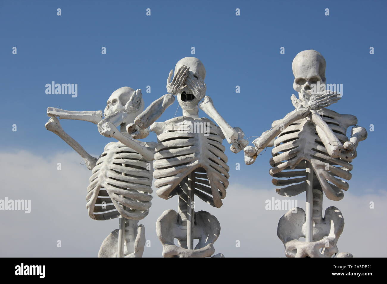 Three skeletons performing the Hear no Evil, See no Evil, Say no Evil ...