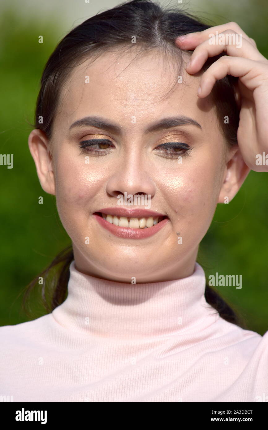 An A Contemplative Female Woman Stock Photo - Alamy