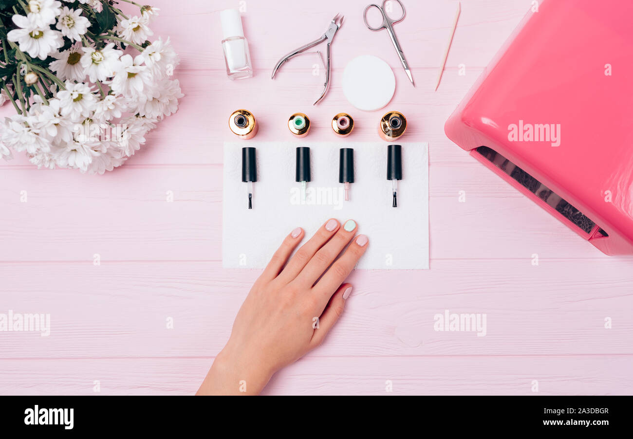 Showing the blue nails hi-res stock photography and images - Alamy