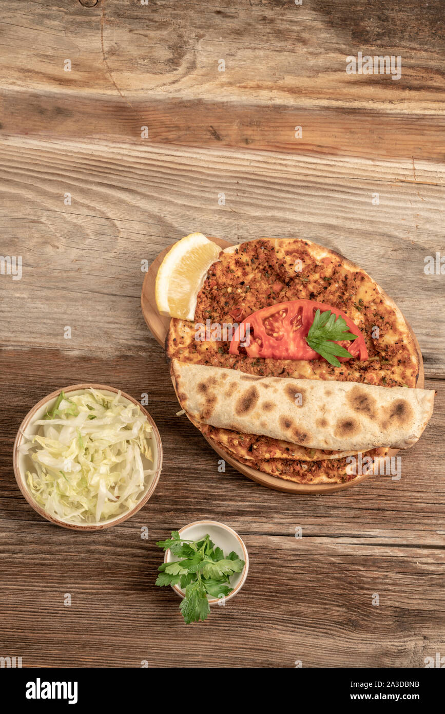 Traditional Turkish pizza that is made of ground beef and onion on a ...
