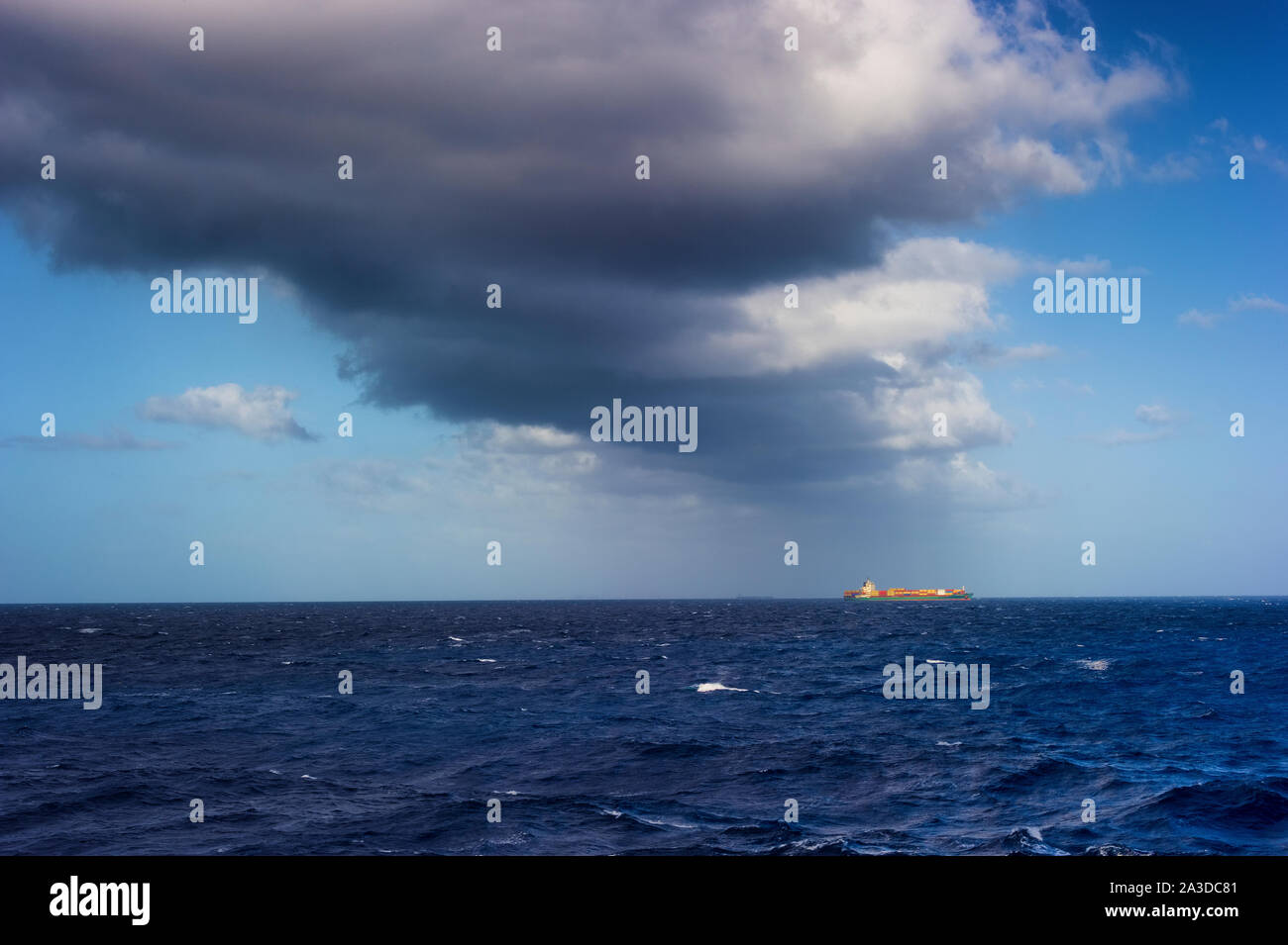 A cruise ship cabin balcony view of a cruise ship in the distance ...