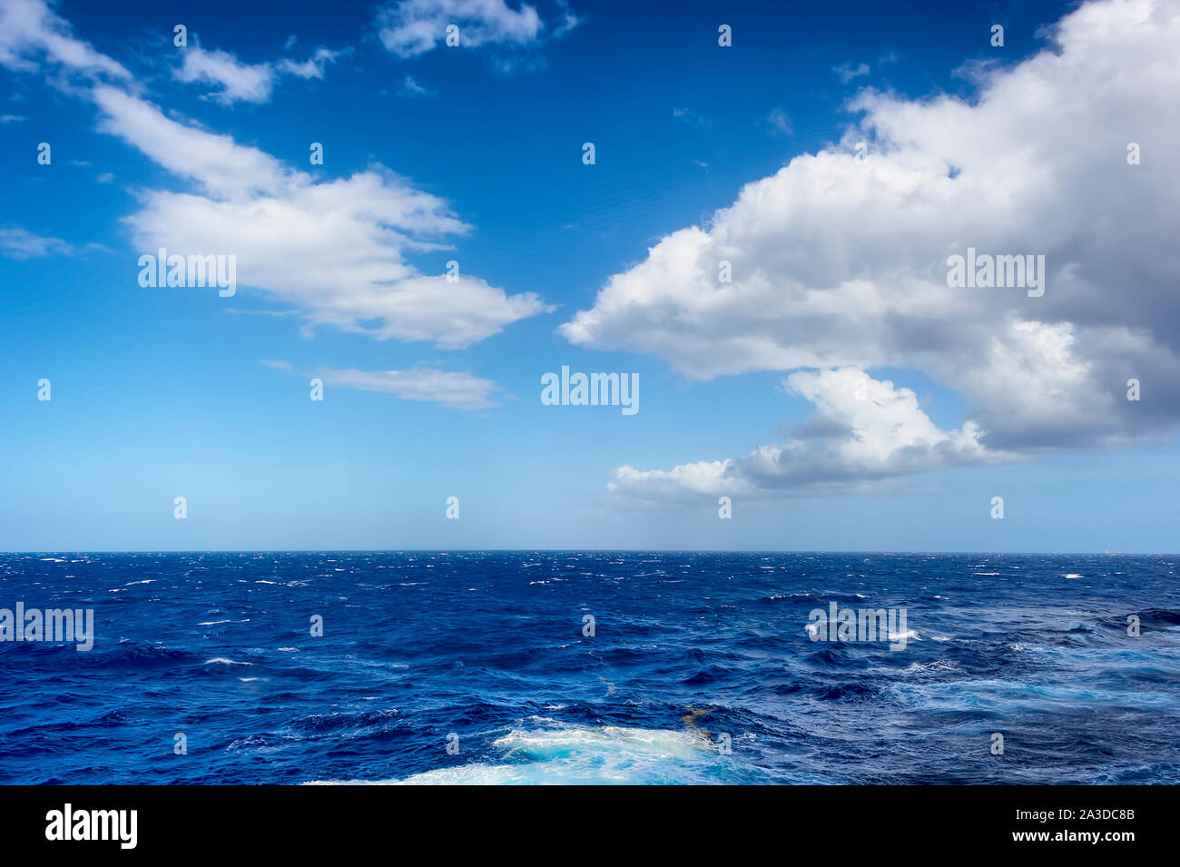 Background image of Atlantic ocean with cloud formations in the sky ...
