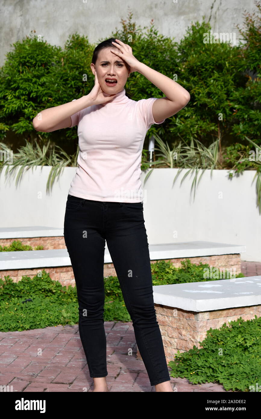 An An Aching Female Woman Stock Photo - Alamy