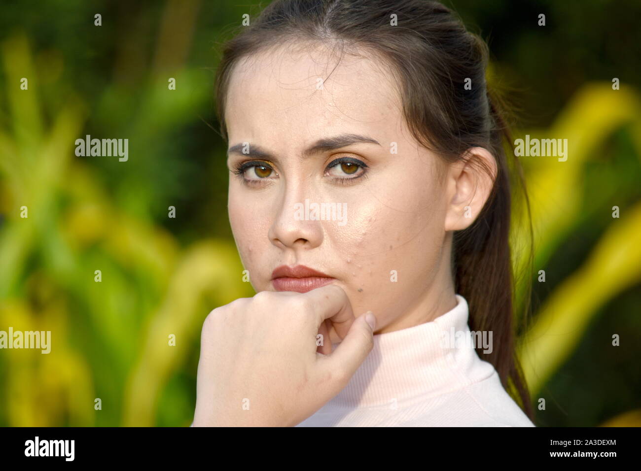 A Filipina Adult Female Decision Making Stock Photo - Alamy