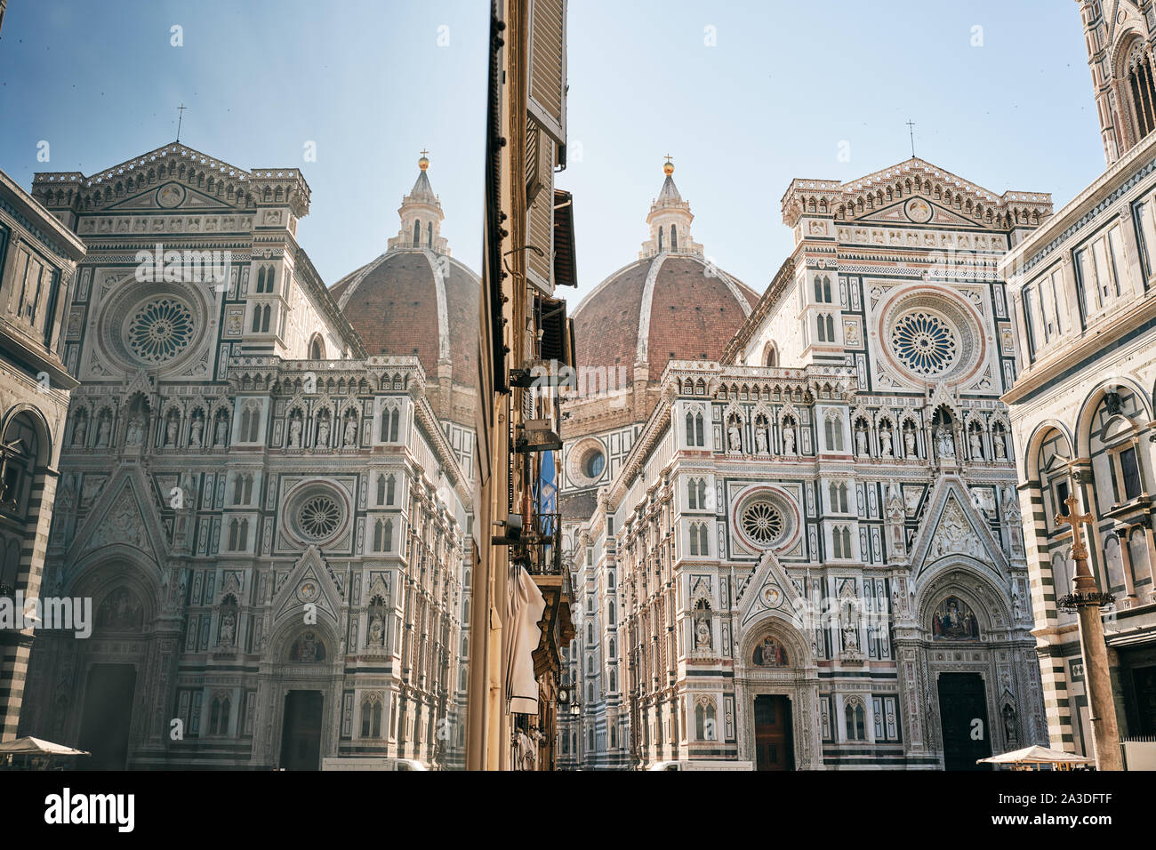 Scenic church building with tall dome and arches in European city and ...