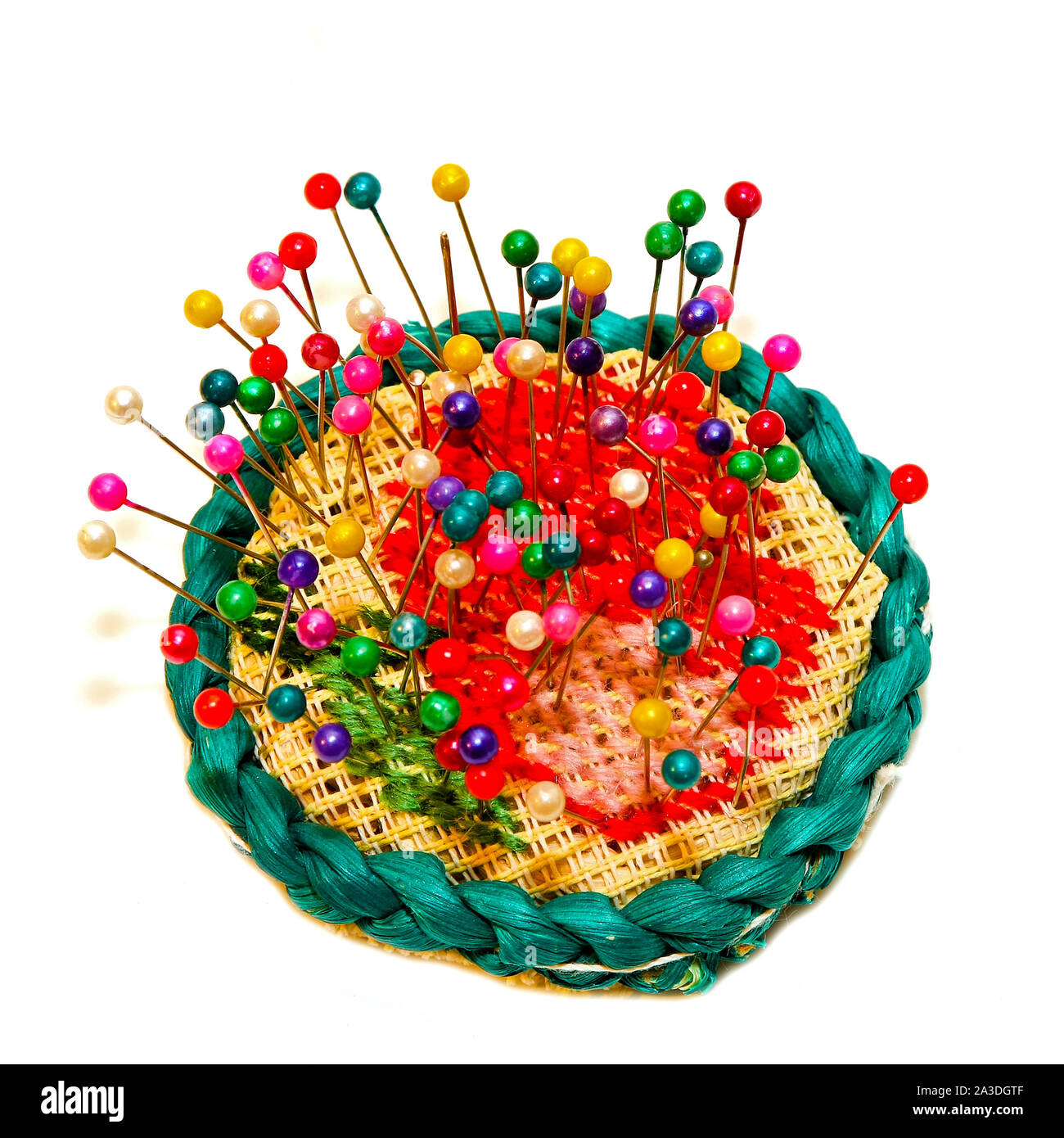 Bunch of colourful pins at round pad Stock Photo - Alamy