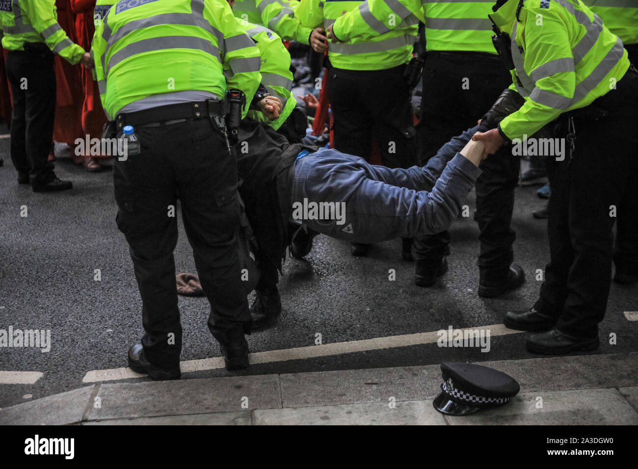 Police carry away extinction rebellion hi-res stock photography and ...