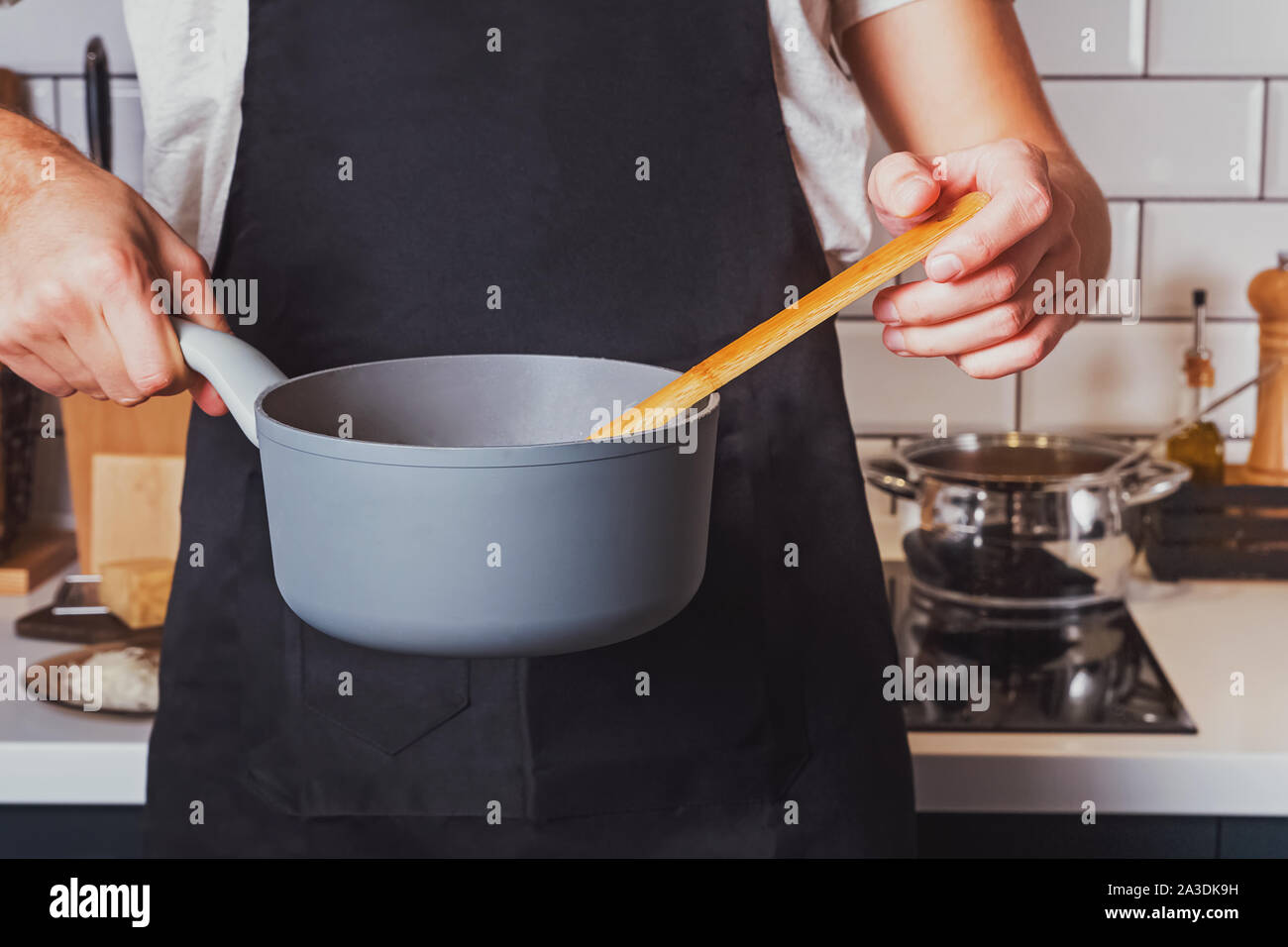 Close up mans hand stirring hi-res stock photography and images - Alamy