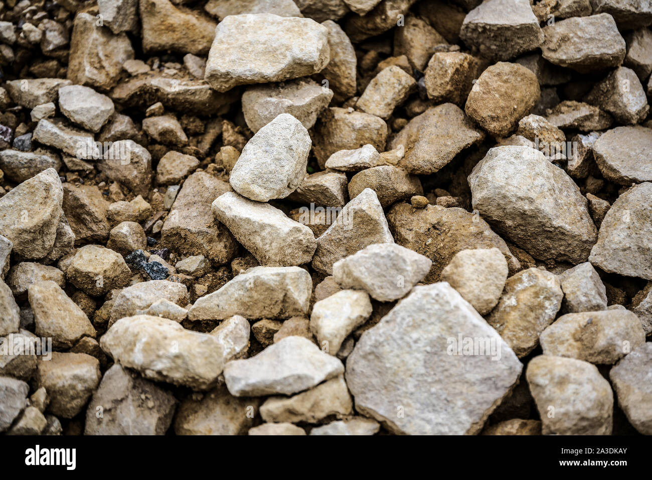 An abstract close up photo of a variety of different sized stones from ...
