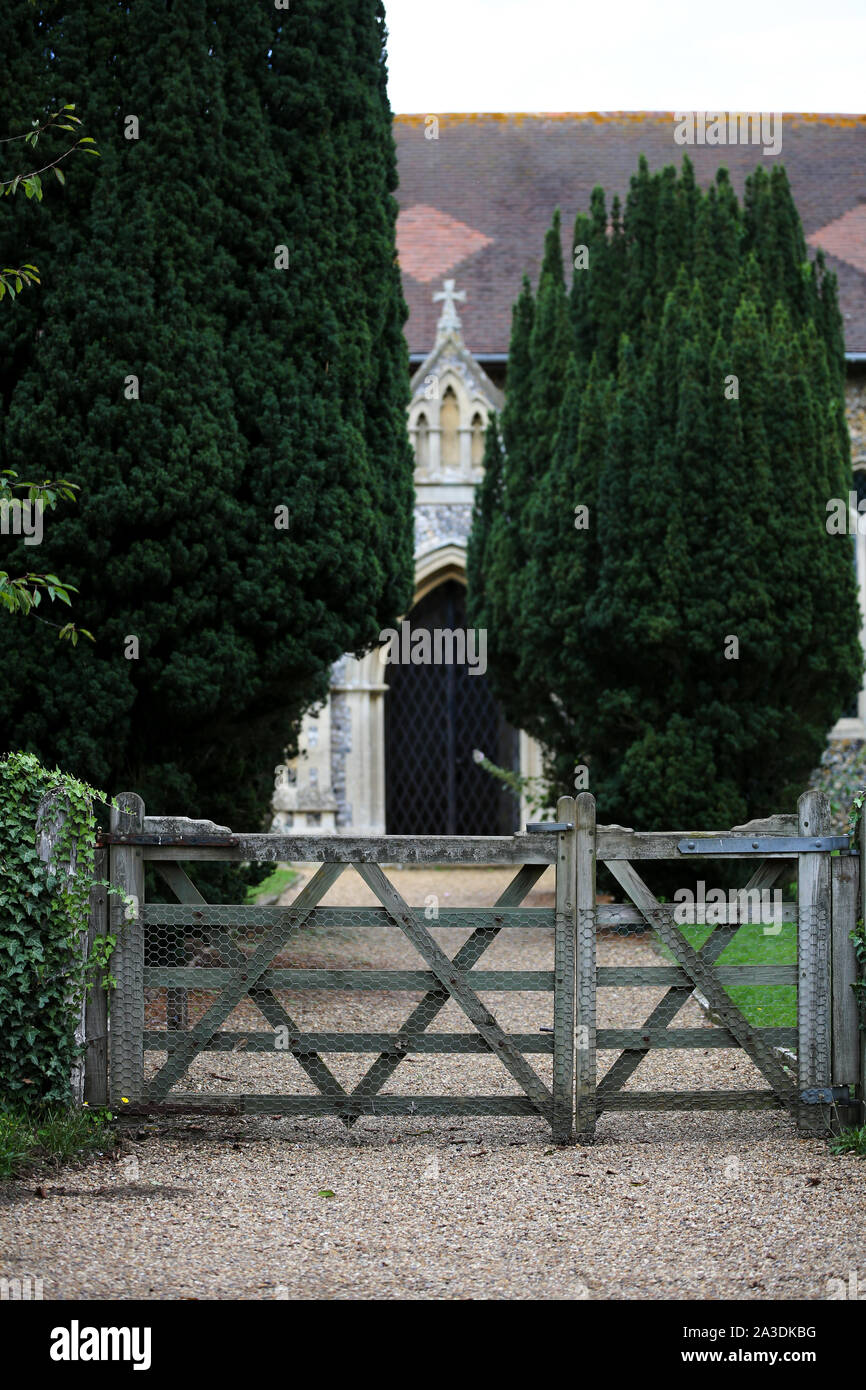 A closed gate leading to a traditional Christian church Stock Photo - Alamy