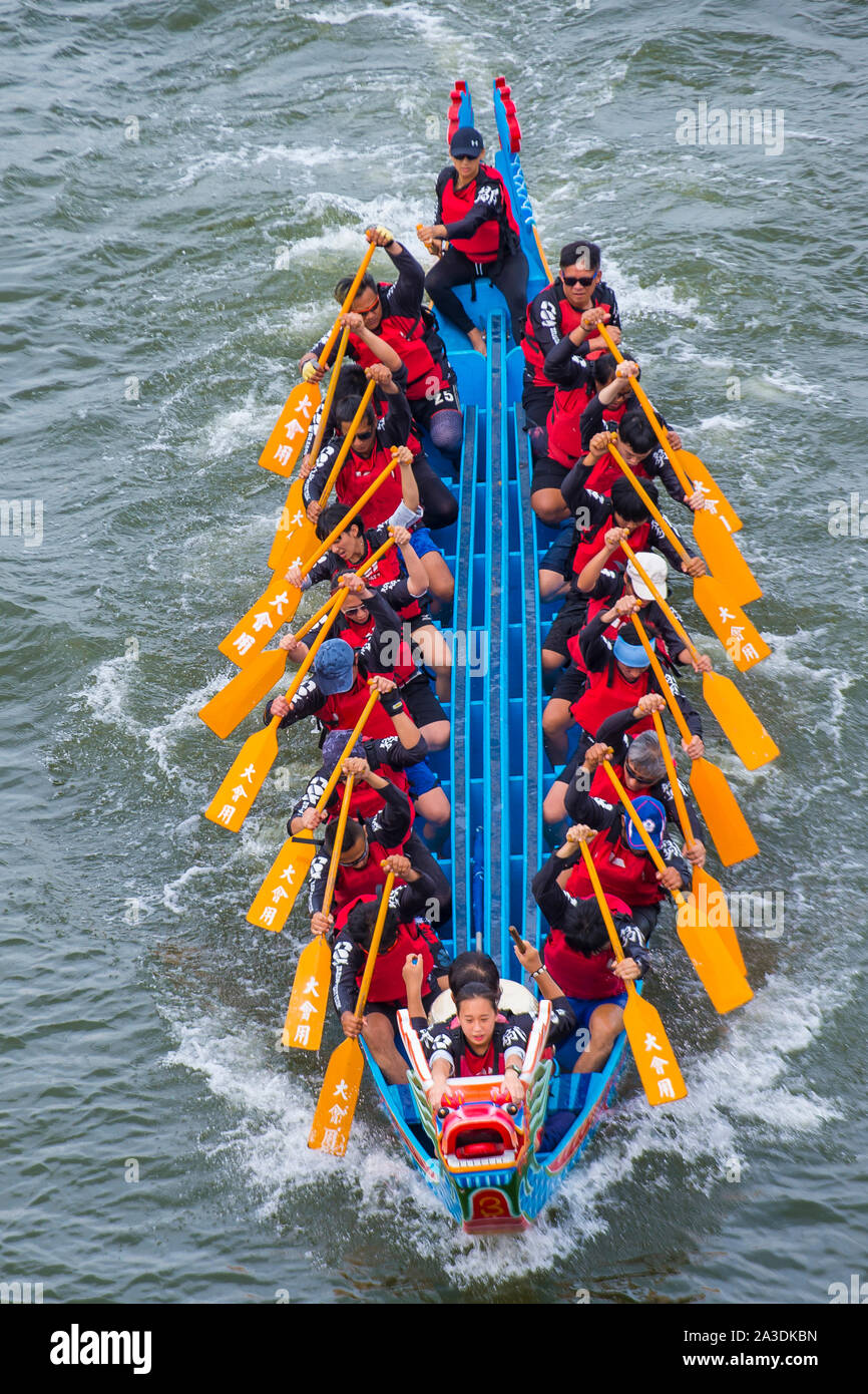 Dragonboat team racing during the 2019 Taipei Dragon Boat festival in ...