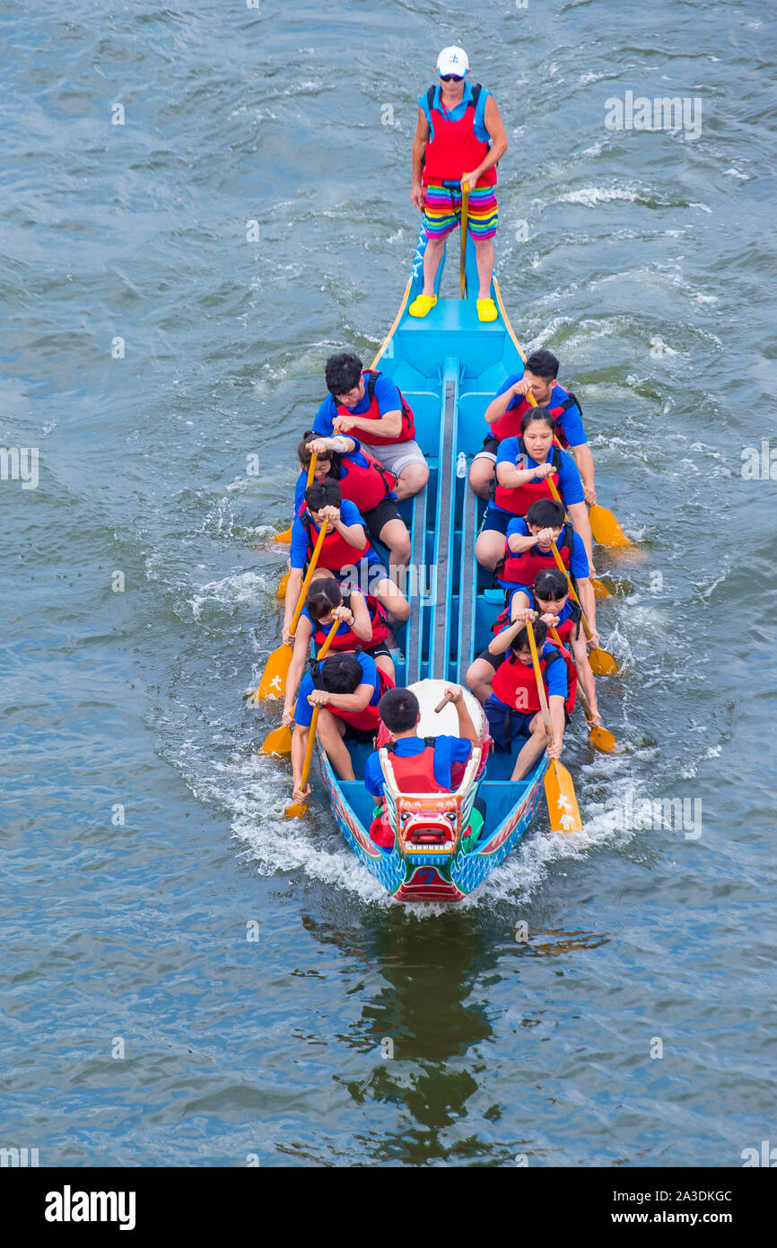 Dragonboat team racing during the 2019 Taipei Dragon Boat festival in ...