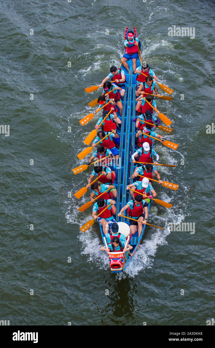Dragonboat team racing during the 2019 Taipei Dragon Boat festival in ...
