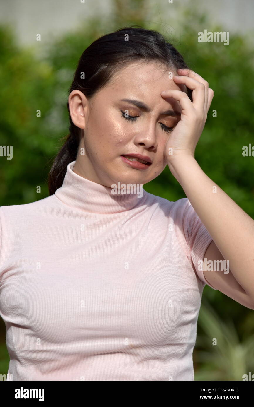 A Worrisome Young Minority Person Stock Photo - Alamy