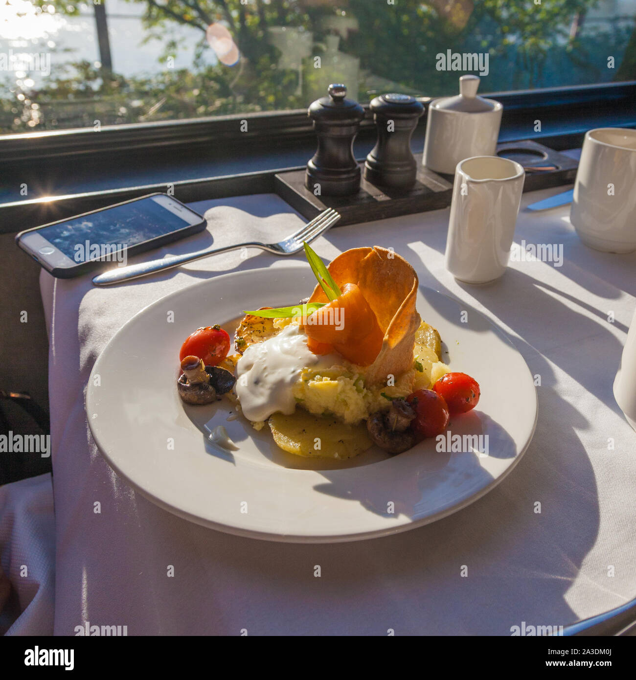 Gourmet breakfast served aboard the Rocky Mountaineer tourist train en ...