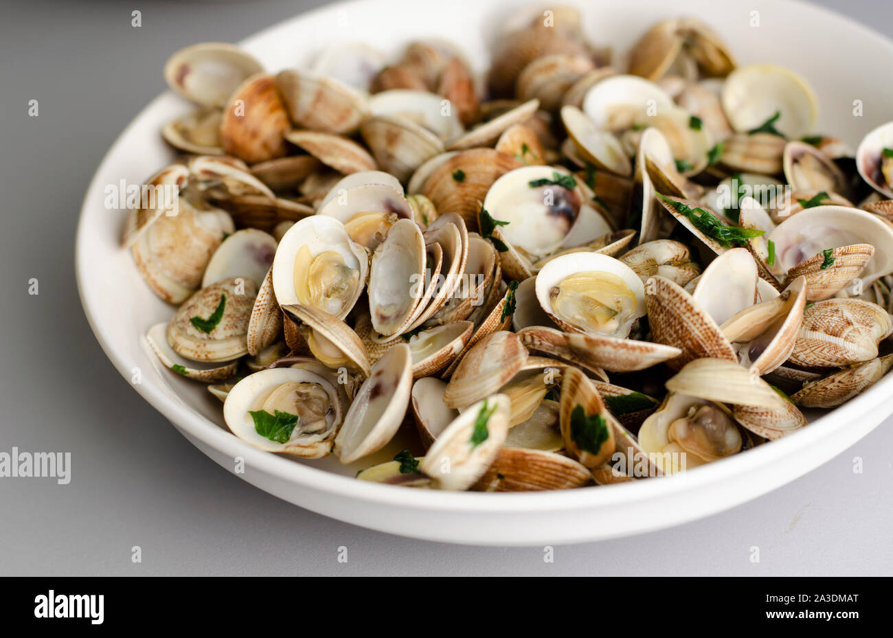 Traditional italian seafood dish with steamed clams. Mediterranean food ...