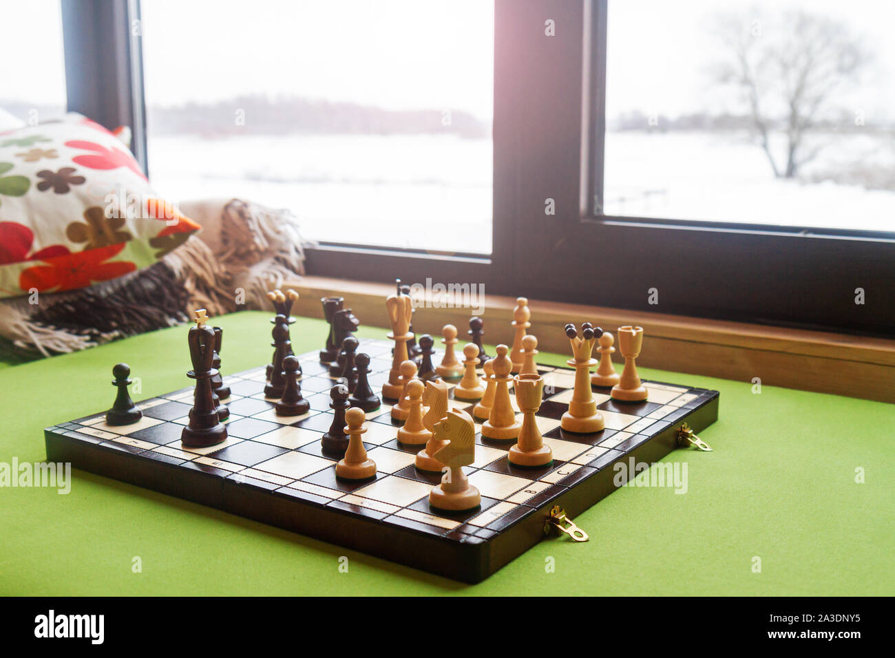 chess stand on a windowsill in a winter day Stock Photo - Alamy
