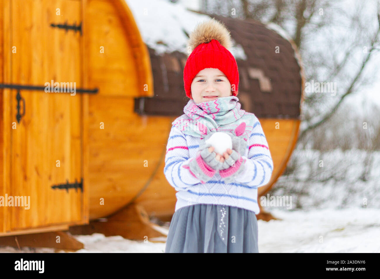 beautiful little girl and first snow Stock Photo - Alamy