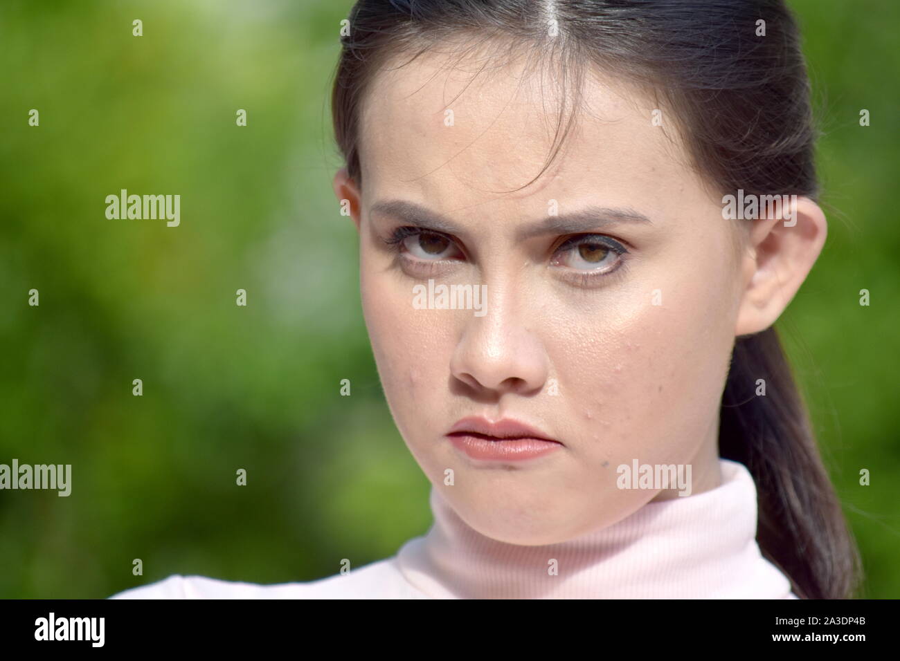 An A Stubborn Female Woman Stock Photo - Alamy