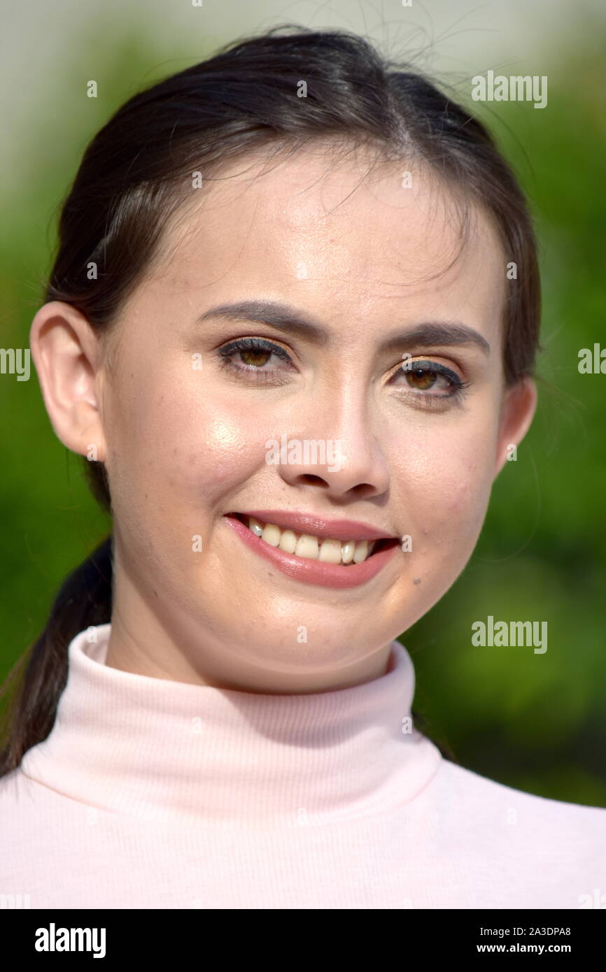 Smiling attractive adult woman hi-res stock photography and images - Alamy