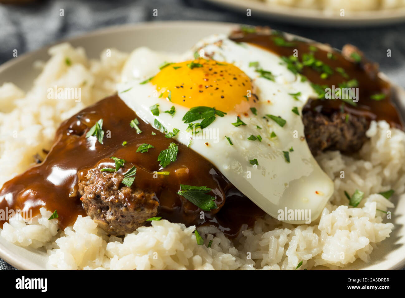 Homemade Hawaiian Loco Moco with Hamburger and Rice Stock Photo - Alamy